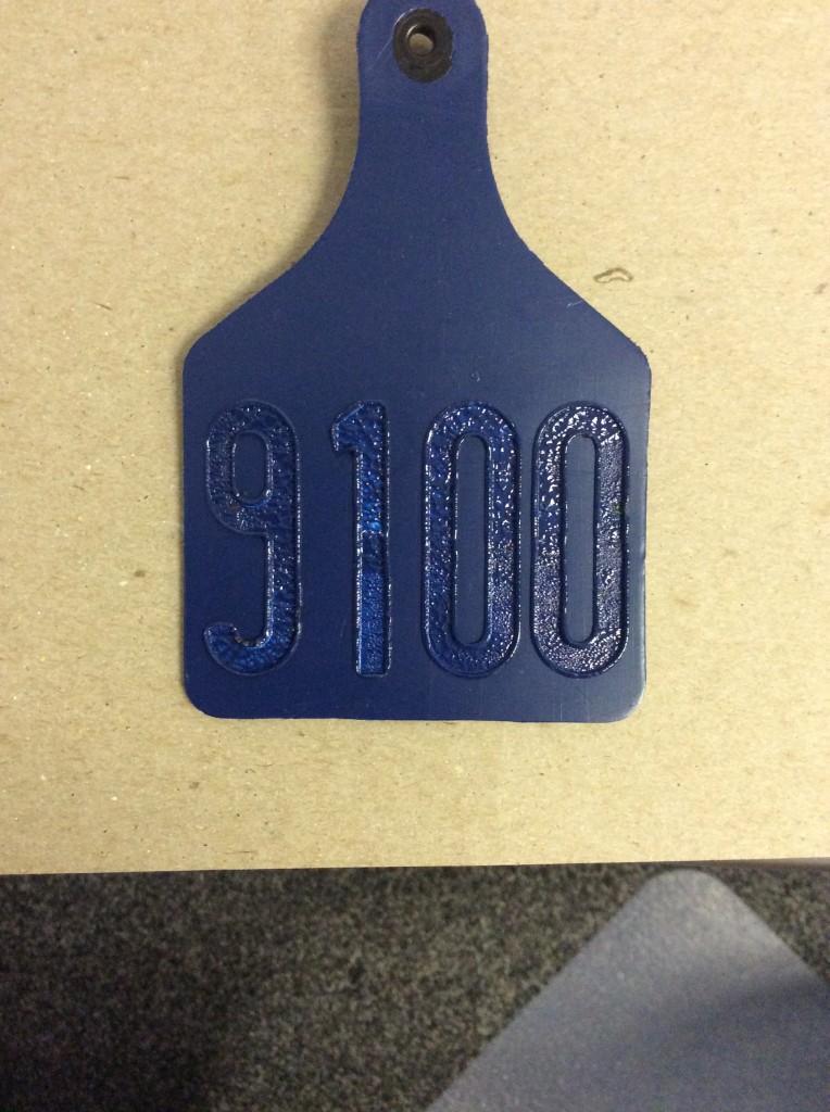 Hot stamp marking cattle tags. – MarkingWiki Presented by Columbia ...